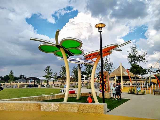 Whimsical butterfly sculptures add artistic flair to this playground that's equal parts fun factory and outdoor gallery.