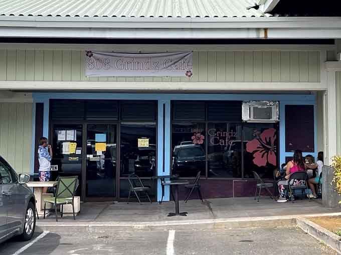 The unassuming storefront of 808 Grindz Cafe proves once again that culinary paradise often hides behind the simplest facades. Breakfast nirvana awaits!