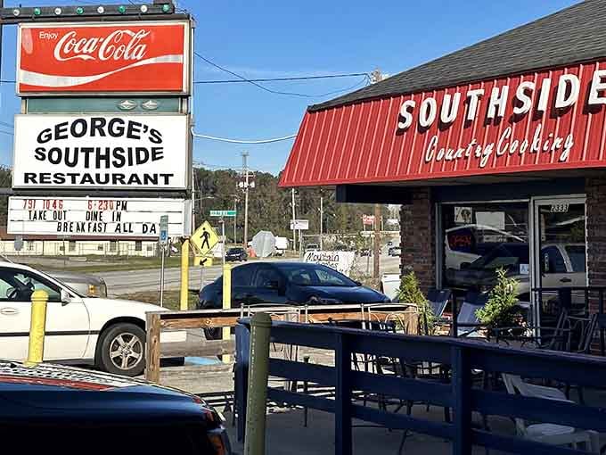That vintage Coca-Cola sign and red roof aren't just decoration, they're a promise of authentic Southern comfort waiting inside.