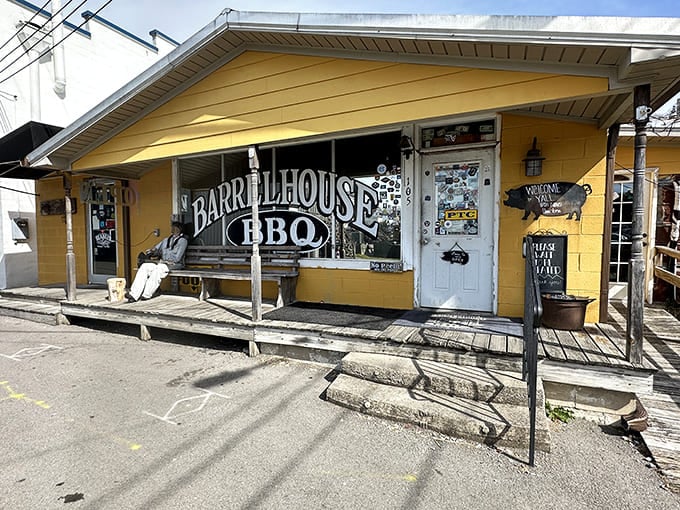 That wooden porch isn't just for show &ndash; it's the final waiting room before barbecue nirvana, where anticipation builds with every whiff of smoke escaping through the door.