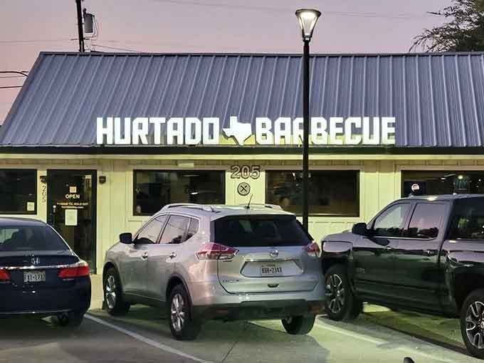 This humble barbecue joint stands as a beacon of smoky promise. The Texas-shaped logo subtly reminds you exactly where good barbecue comes from.