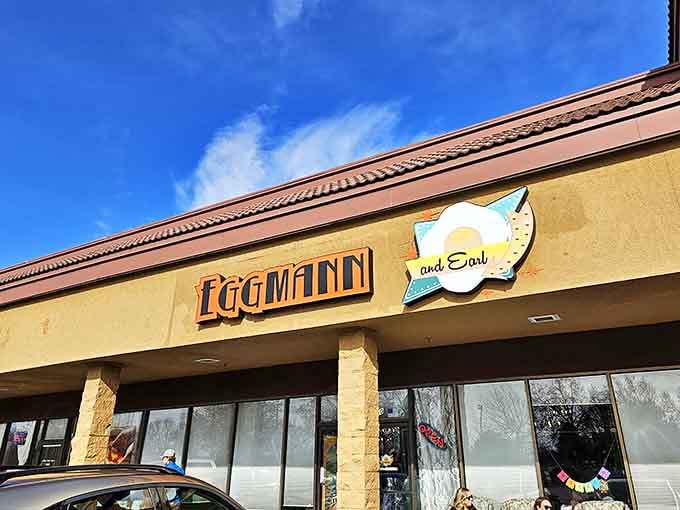 The sunny exterior of Egg Mann and Earl beckons like a breakfast beacon against Idaho's blue sky, promising morning magic inside.