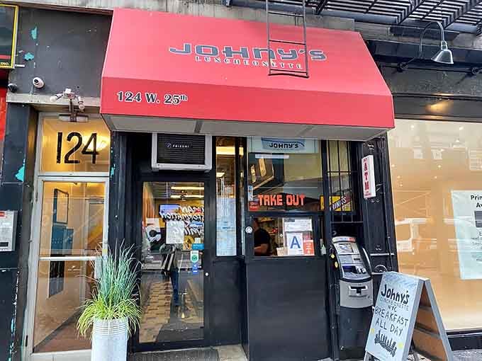 That red awning is your beacon to breakfast bliss in the heart of Greenwich Village.