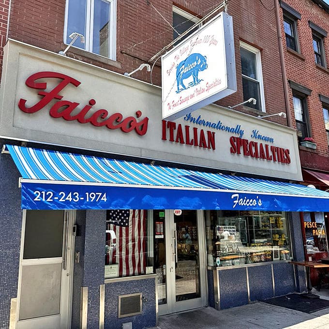 The iconic red lettering of Faicco's against the brick facade isn't just a sign&mdash;it's a beacon for sandwich pilgrims seeking Italian-American nirvana on Bleecker Street.
