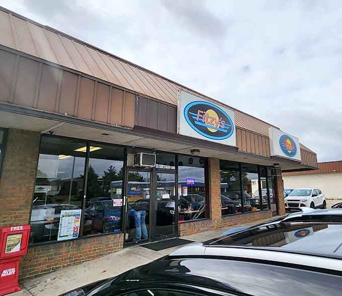 Fitzy's unassuming storefront beckons hungry travelers with its retro blue signage &ndash; like a beacon of breakfast hope on a cloudy Ohio morning.