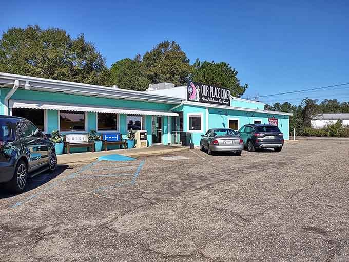 That turquoise exterior isn't just paint, it's a beacon of hope for anyone who's ever craved real breakfast.