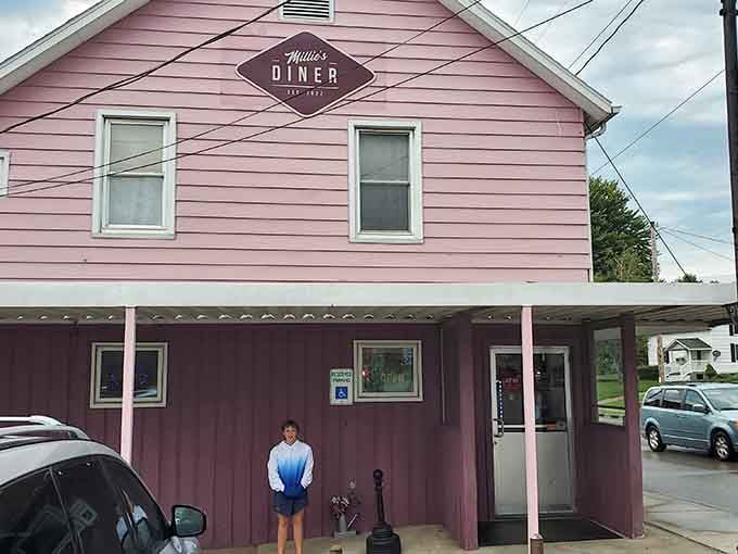 That cheerful pink exterior isn't just paint—it's a promise of the homemade goodness waiting inside this beloved diner.