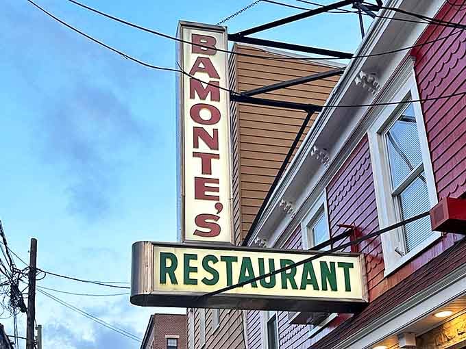 Bamonte's vintage neon signage glows against the Brooklyn sky, a beacon of old-school Italian dining excellence.