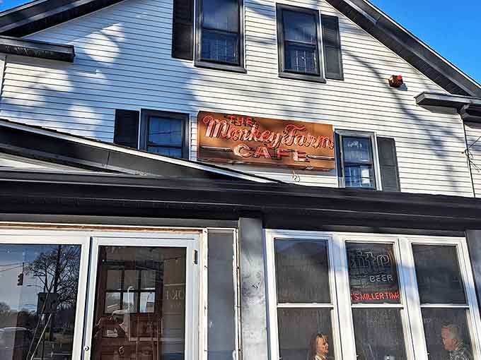 That iconic red neon sign beckons hungry travelers like a lighthouse for seafood lovers on Connecticut's shoreline.