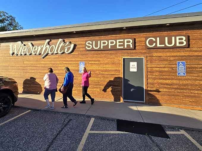 The wood-paneled exterior promises old-school supper club charm, and trust me, it delivers on every delicious word.