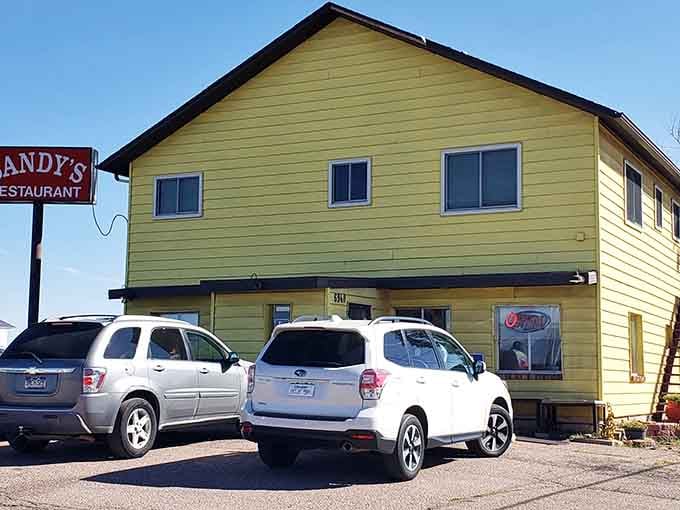 Sandy's unassuming facade might fool you, but locals know this sunshine-colored building houses cinnamon roll magic worth traveling miles to experience.