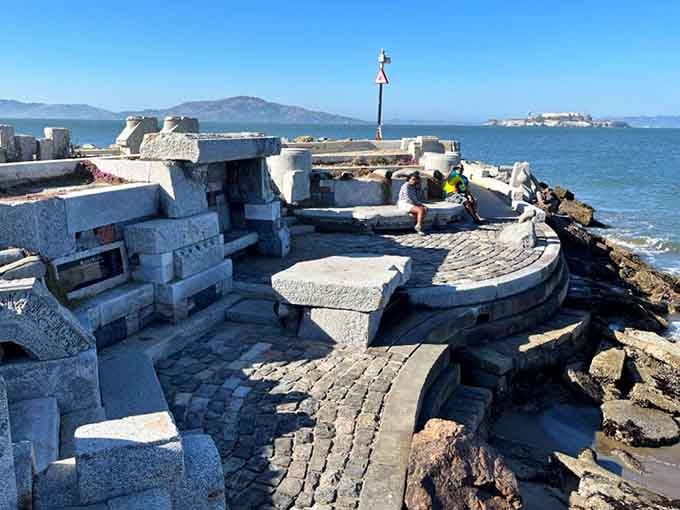 Ancient stones meet modern art in this waterfront amphitheater where the bay becomes the performer.