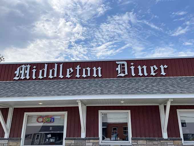 The iconic red exterior of Middleton Diner stands like a beacon of comfort food in rural Michigan, promising homestyle cooking and small-town charm.
