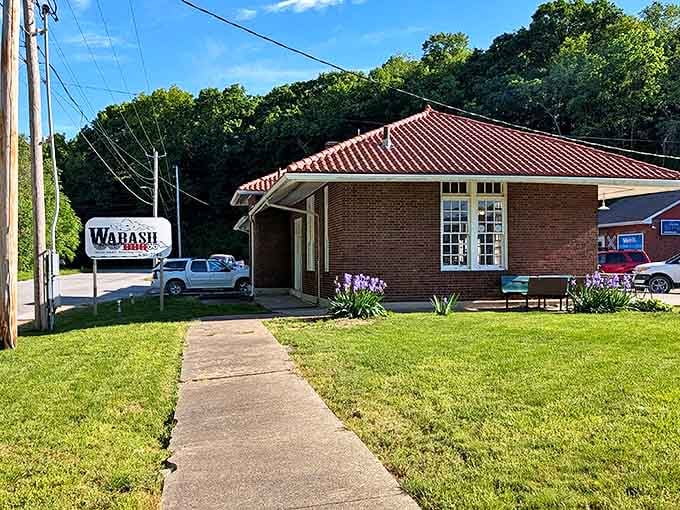 The iconic red-tiled roof of Wabash BBQ stands out like a beacon of hope for hungry travelers. This former railroad depot now signals the arrival of smoky deliciousness.