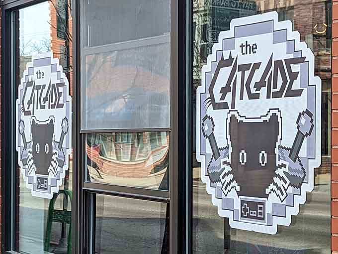 The pixel-art cat logo on the windows is your first hint that nostalgia meets feline love here.