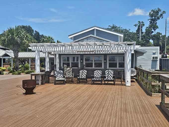 Another angle of coastal perfection, complete with palm trees and enough deck space for serious relaxation.