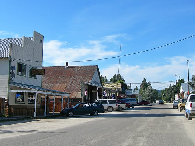 Main Street whispers tales of gold rush dreams, where rusty tin roofs and weathered storefronts create a living museum under Idaho's big sky.