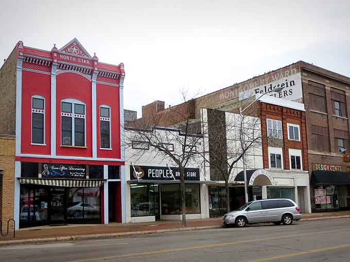 The vibrant red North Star building stands proudly among historic storefronts, bringing classic charm to this welcoming downtown street.
