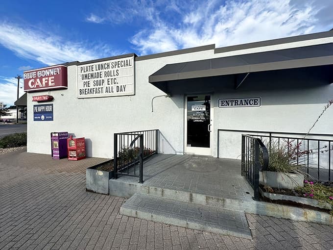 That red sign isn't just marking a restaurant; it's pointing you toward pie-induced enlightenment and carb-fueled happiness.