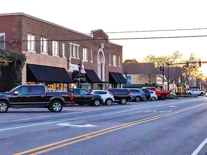 Sunset bathes Foley's brick facades in golden light, turning an ordinary evening into the kind of moment that makes you pause mid-conversation and reach for your camera.