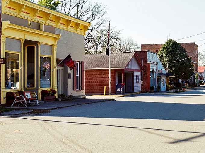 Yellow trim and brick facades create a streetscape so perfectly preserved you'll check your phone to confirm the year.