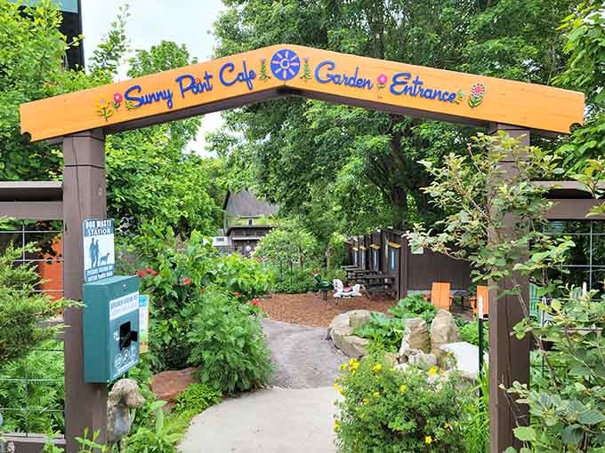 Garden entrance archway invites you into a breakfast sanctuary where fresh herbs grow steps from your future plate.