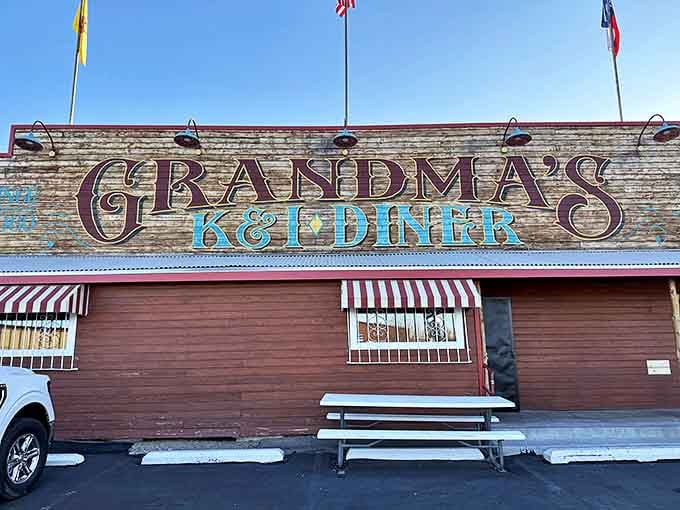 The brick-red exterior of Grandma's K & I Diner stands proudly against New Mexico's brilliant blue sky, a beacon of comfort food excellence.