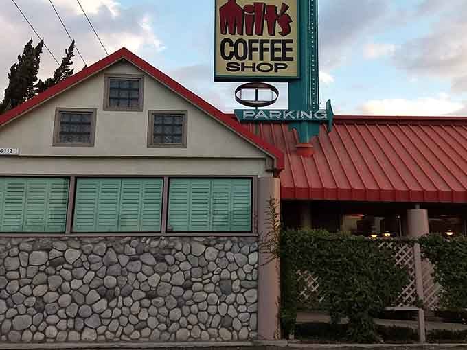 Evening light hits that stone facade just right, making this retro gem glow like a postcard from happier times.