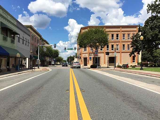 Tree-lined streets and classic architecture remind you that some Florida towns still remember what "neighborhood" actually means.