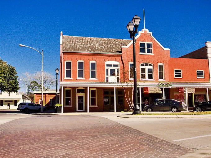 Historic brick buildings line Crowley's downtown district, where charming architecture and affordable living combine to create retirement paradise.