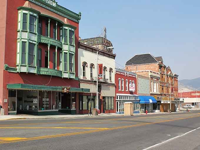 Historic brick buildings line Butte's downtown, where your dollar stretches further than your imagination. A vintage advertisement hints at the city's colorful past.