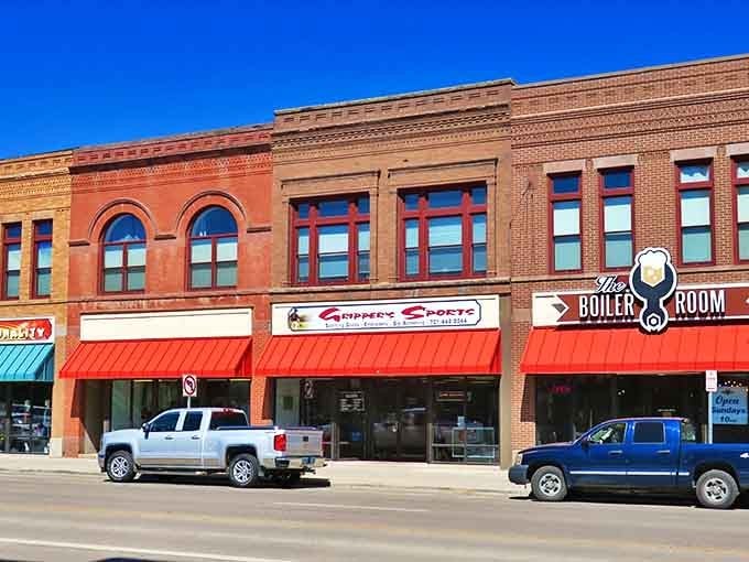 Historic brick buildings house modern businesses, proving old bones can learn new tricks without losing their charm.
