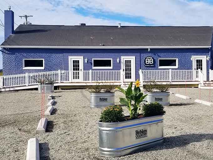 That blue exterior isn't just pretty, it's a beacon calling you to lobster paradise in Groton.