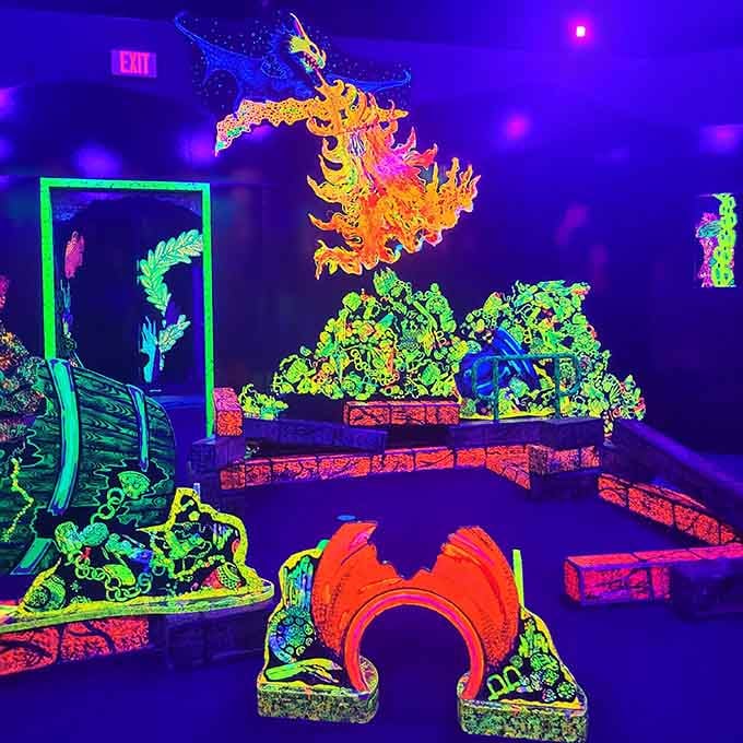 The neon glow of this mini-golf course sets the stage for a colorful and vibrant adventure through a fantastical world.