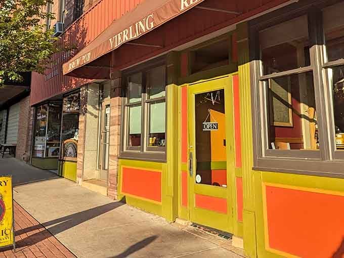 Those cheerful orange and yellow doors practically sing "come on in, friend" louder than any neon sign ever could.