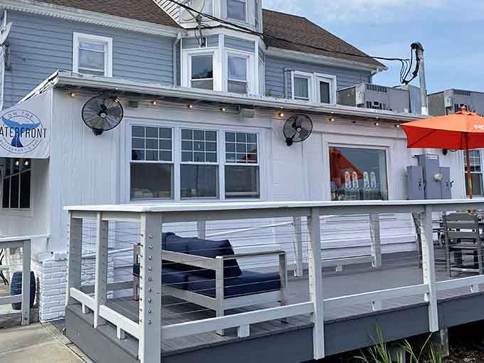 That charming white deck isn't just for show&mdash;it's your front-row seat to harbor views that make everything taste just a little bit better.