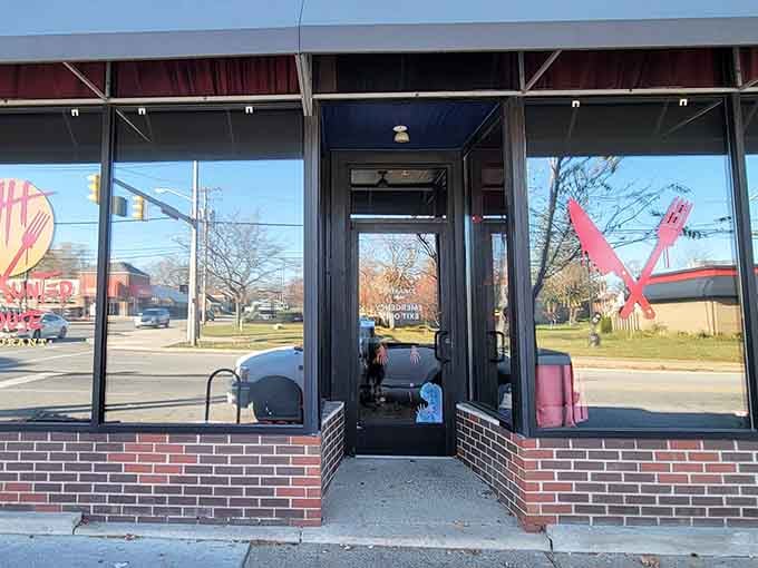 When your restaurant sign features a fork and knife crossed like horror movie weapons, you know dinner's going to be interesting.