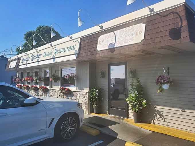 Those hanging flower baskets aren't just decoration; they're a promise that someone here actually cares about details.