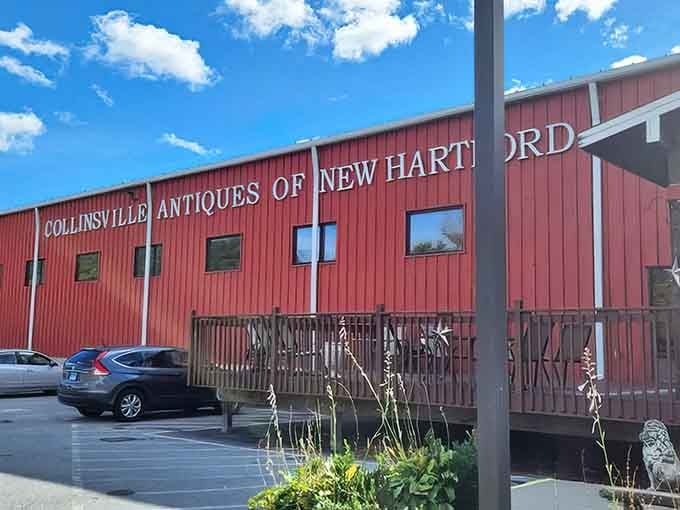 That distinctive red barn-style building is your beacon to treasure hunting paradise in New Hartford.