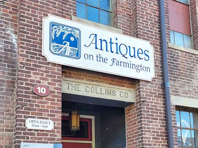 The sign says it all: treasures await inside this historic brick building where shopping becomes an adventure worth bragging about.