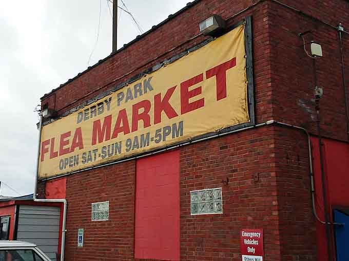 The unassuming brick exterior of Derby Park Flea Market beckons with its vintage charm and promise of weekend treasure hunting adventures.