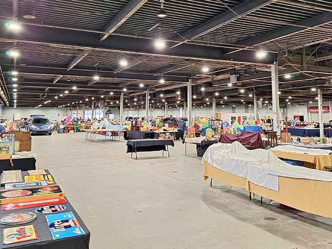 The vast expanse of vendor tables stretches like a retail promised land under those industrial lights.
