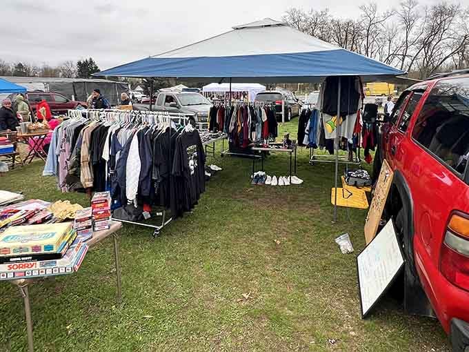 Clothing racks stretch into infinity while blue canopies promise shelter from Michigan's ever-changing moods and unpredictable shopping weather patterns.