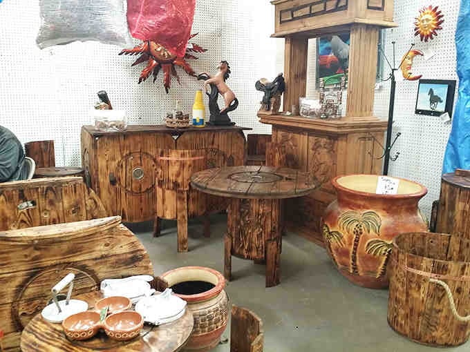 Southwestern charm meets rustic craftsmanship in this display of handcrafted wooden furniture and pottery that would make any desert home feel authentically New Mexican.