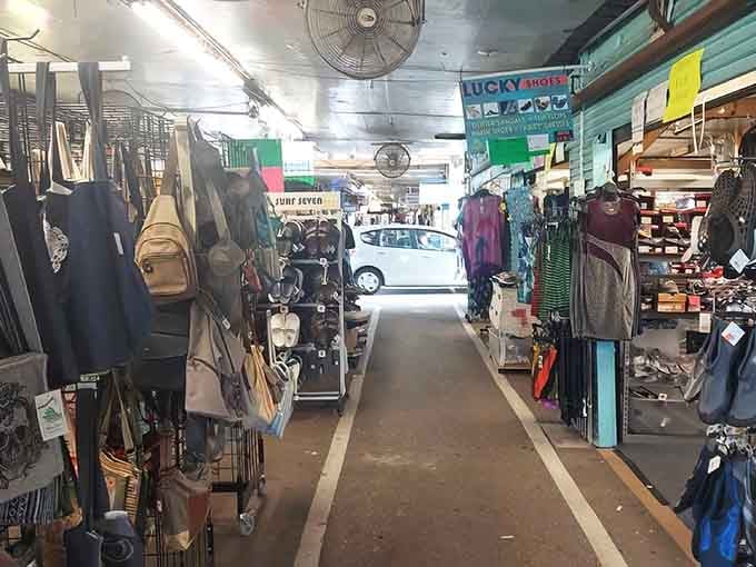 Those overhead fans working overtime tell you everything you need to know about Florida flea market life and comfort.