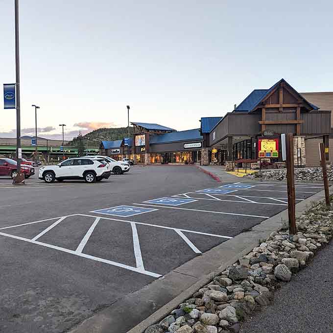 Mountain shopping never looked so inviting, with those timber peaks framing your retail adventure perfectly.