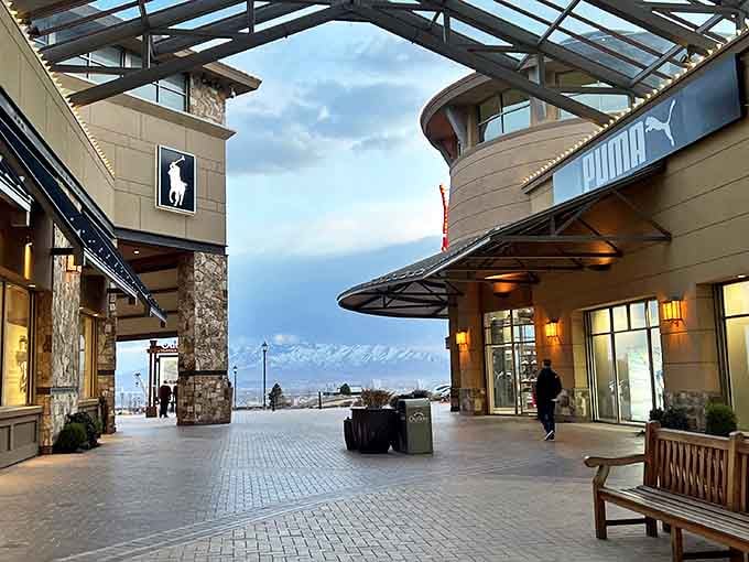 Where mountain views meet designer discounts. This stunning backdrop makes even a Tuesday shopping trip feel like a glamorous getaway.