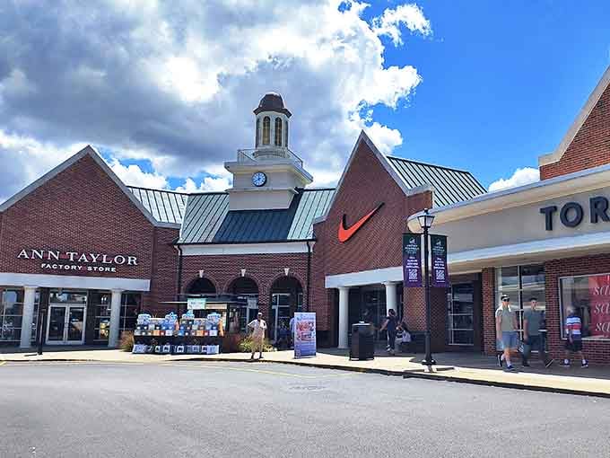 The charming clock tower centerpiece anchors Ann Taylor and Nike stores, creating a colonial-inspired shopping haven.