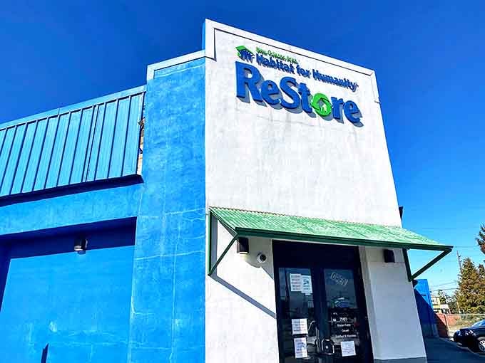 The iconic blue and white facade of the ReStore stands like a beacon of bargain hope against the New Orleans sky. Treasure hunting starts here!