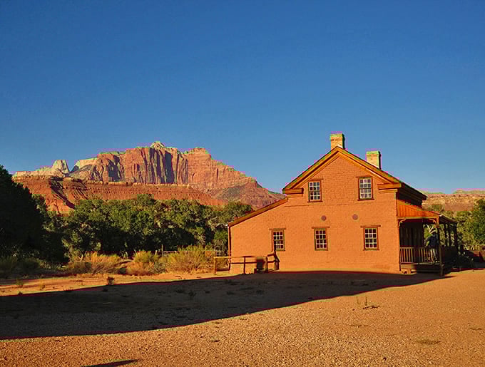 The Russell Home stands proudly against Zion's dramatic backdrop, like a defiant time traveler refusing to fade into history's shadows.